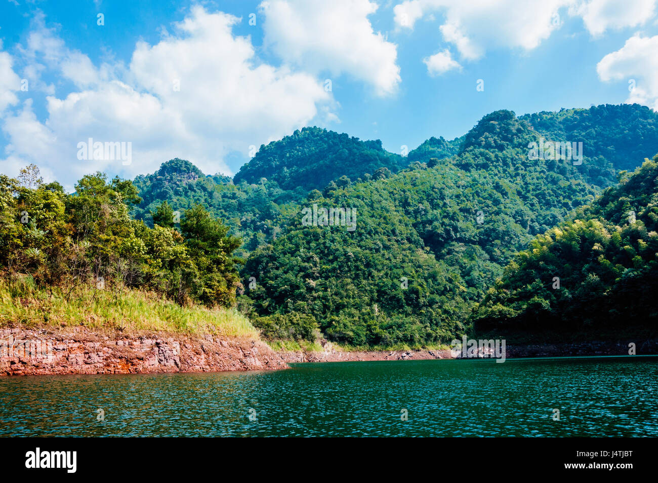 The reservoir scenery with blue sky in summer Stock Photo - Alamy