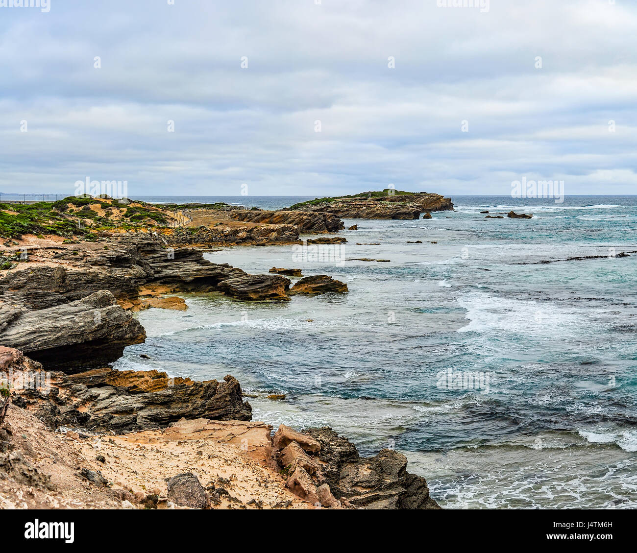 The sharp rocks on the Australian coast of the Pacific ocean Stock ...