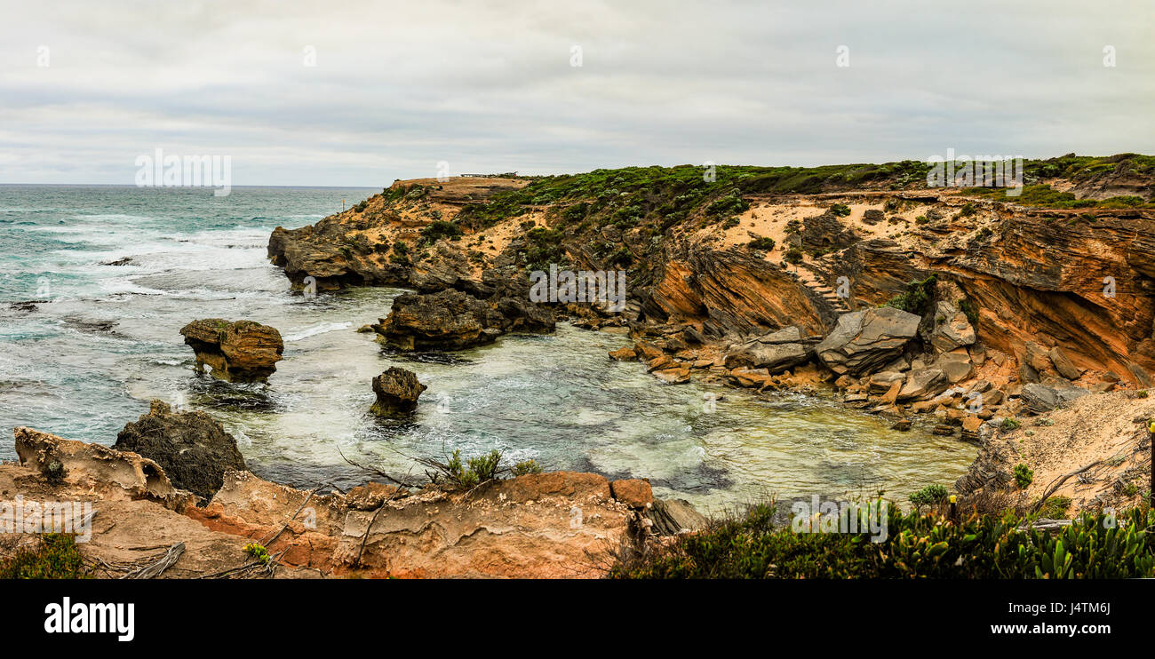 The sharp rocks on the Australian coast of the Pacific ocean Stock ...