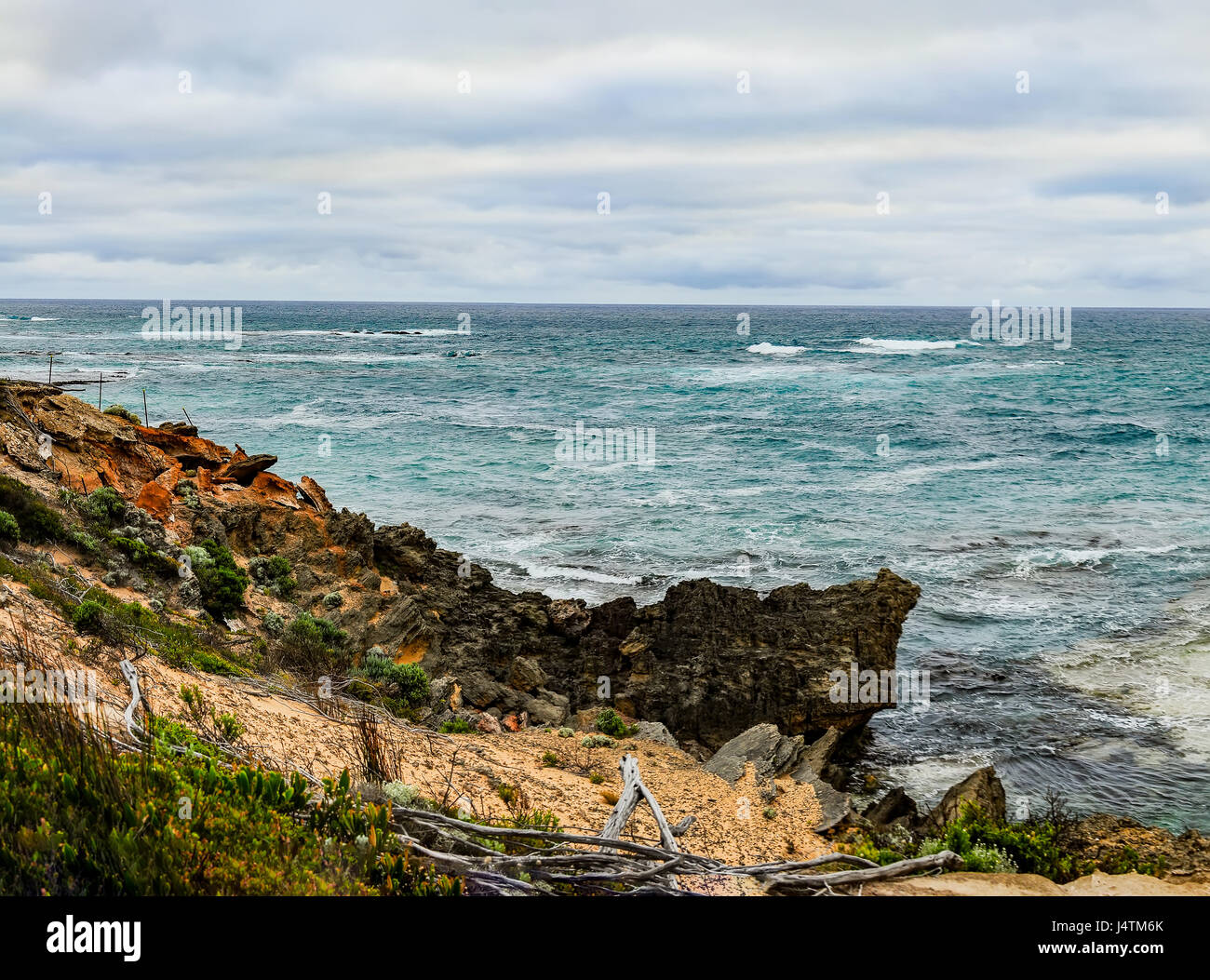 The sharp rocks on the Australian coast of the Pacific ocean Stock ...