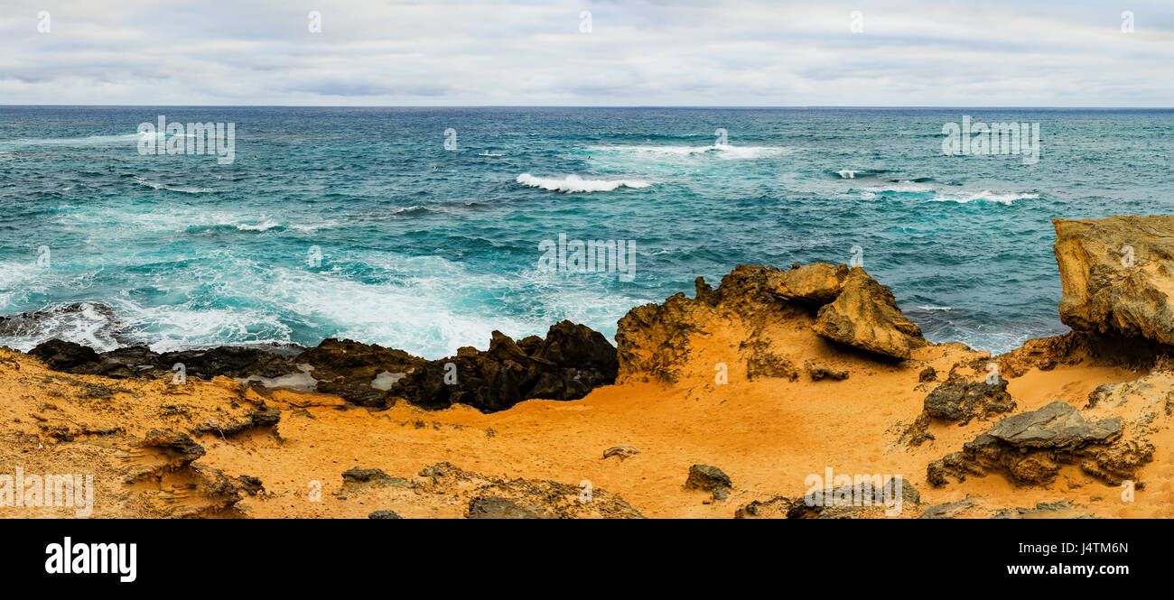 The sharp rocks on the Australian coast of the Pacific ocean Stock ...