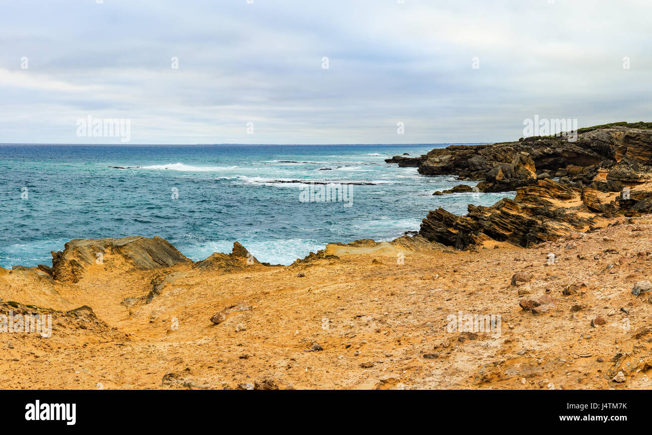 The sharp rocks on the Australian coast of the Pacific ocean Stock ...