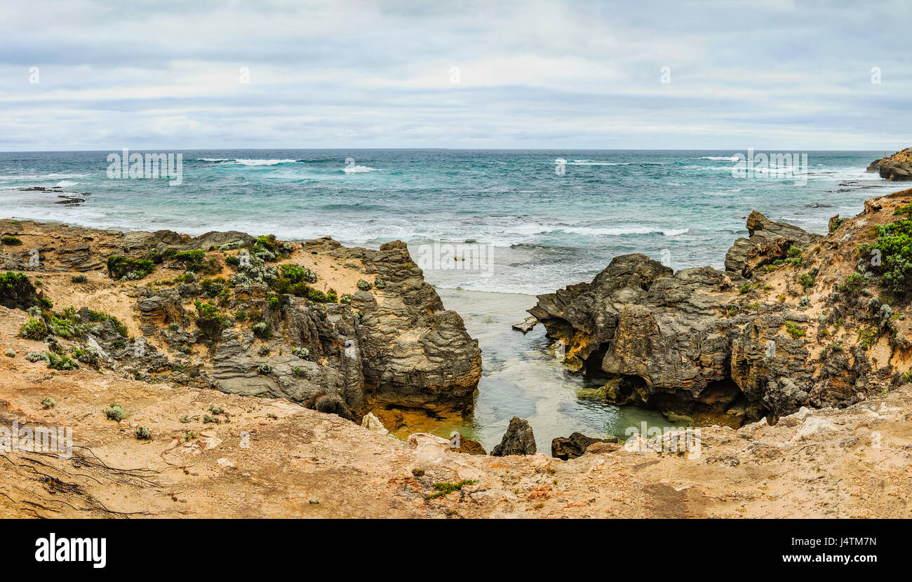 The sharp rocks on the Australian coast of the Pacific ocean Stock ...