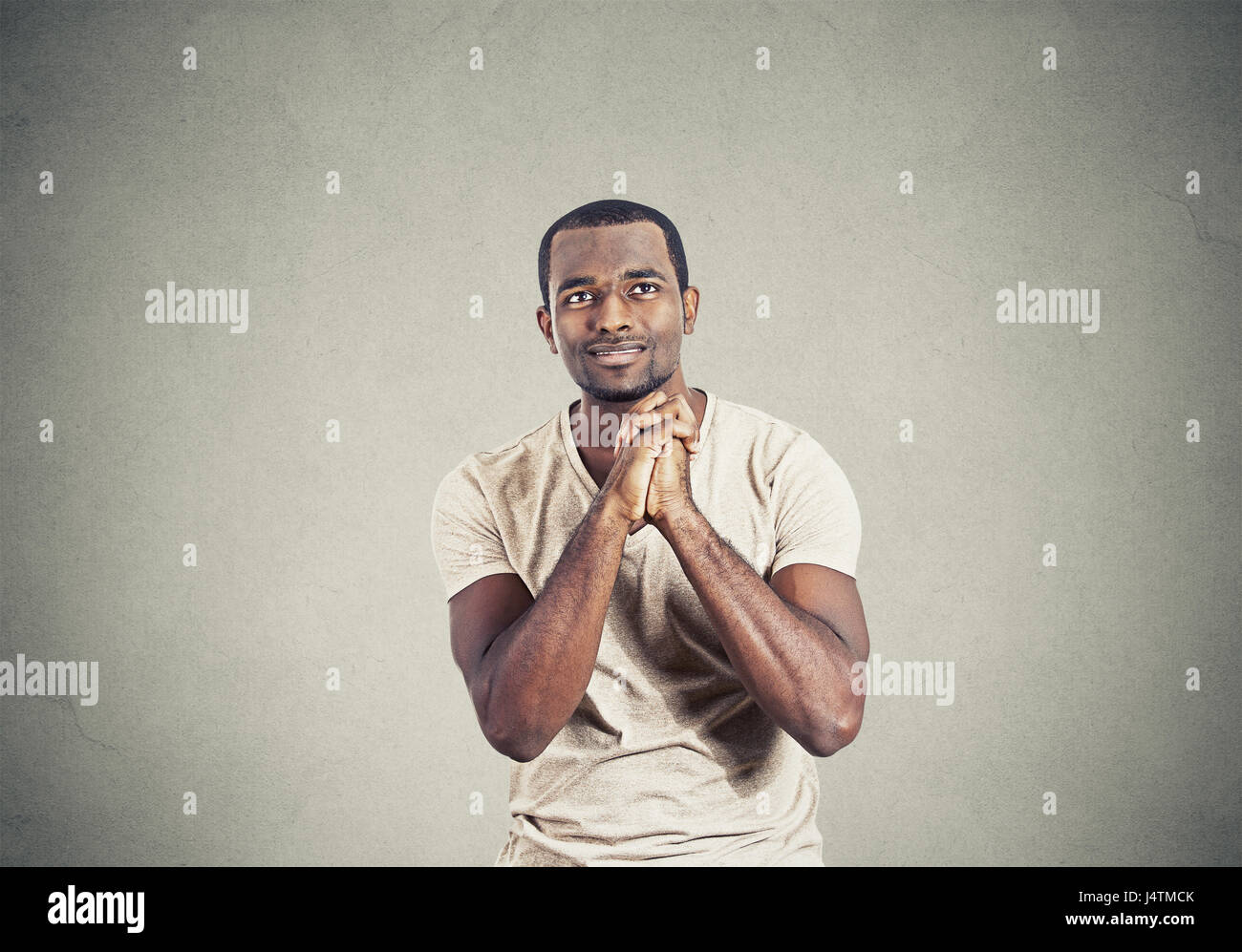 Sad man looking up Stock Photo - Alamy