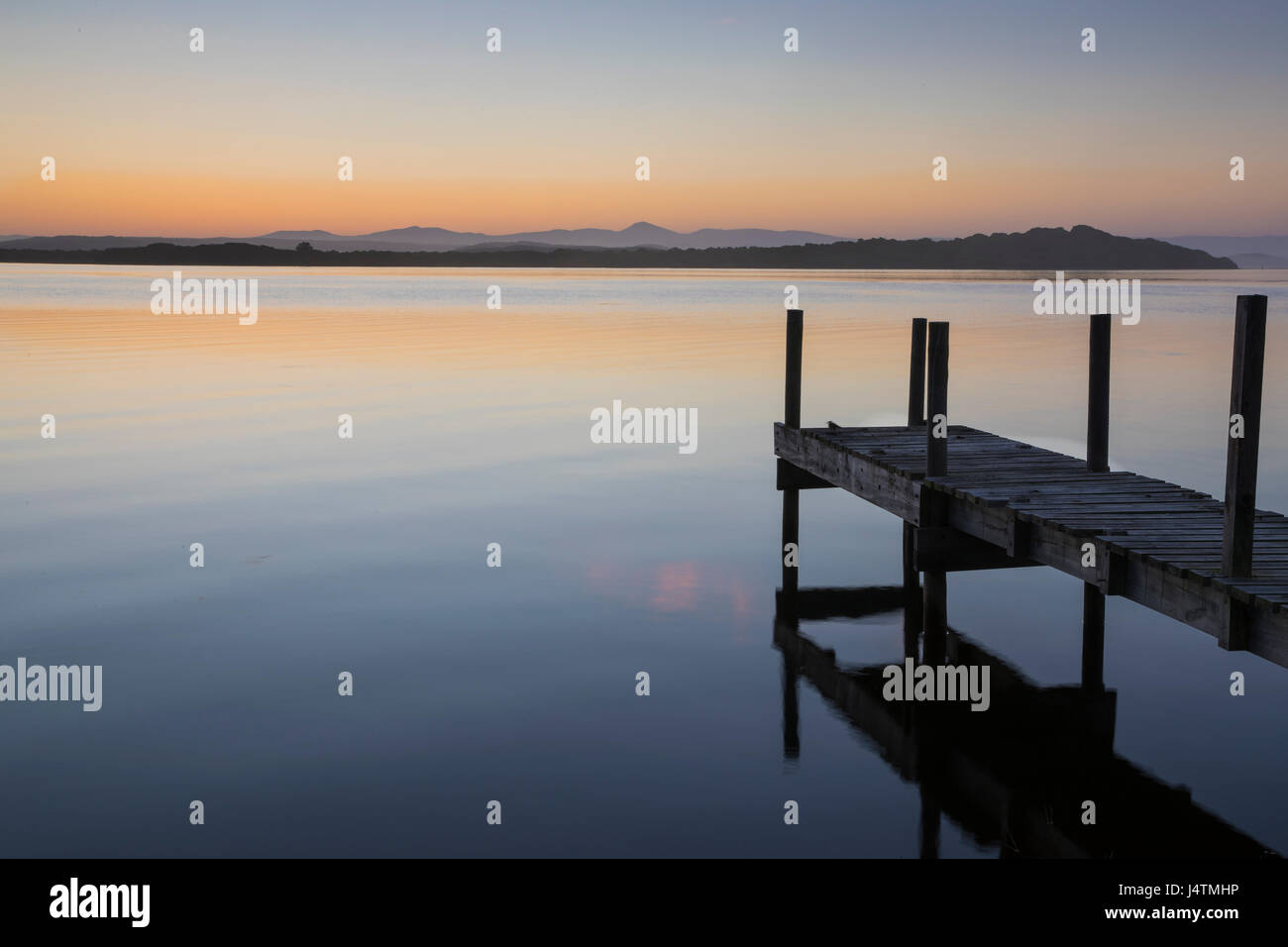 Wood jetty sunrise in Hermanus South Africa Stock Photo - Alamy