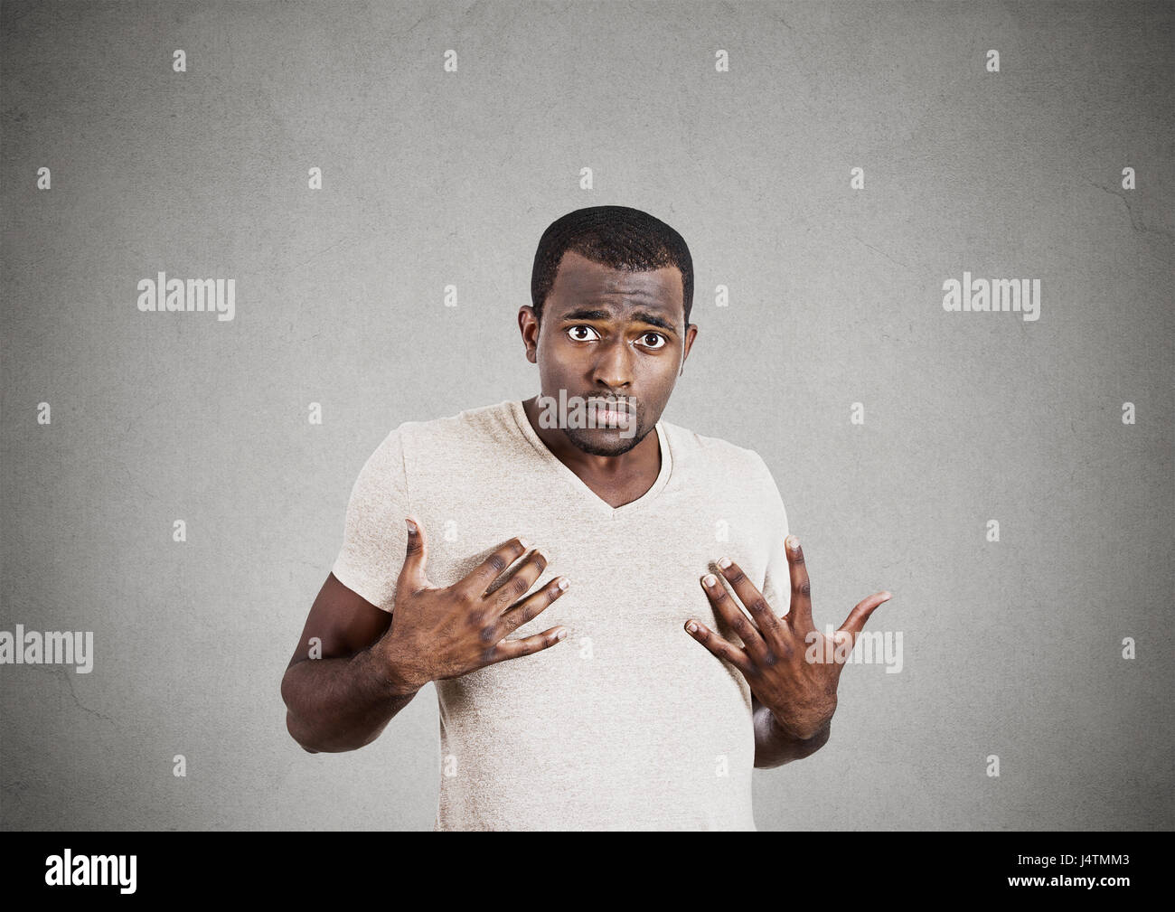 Closeup portrait unhappy annoyed young man, getting mad asking question ...