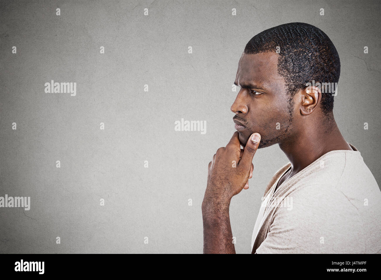 Portrait thoughtful young man Stock Photo - Alamy Portrait thoughtful young man Stock Photo - Alamy