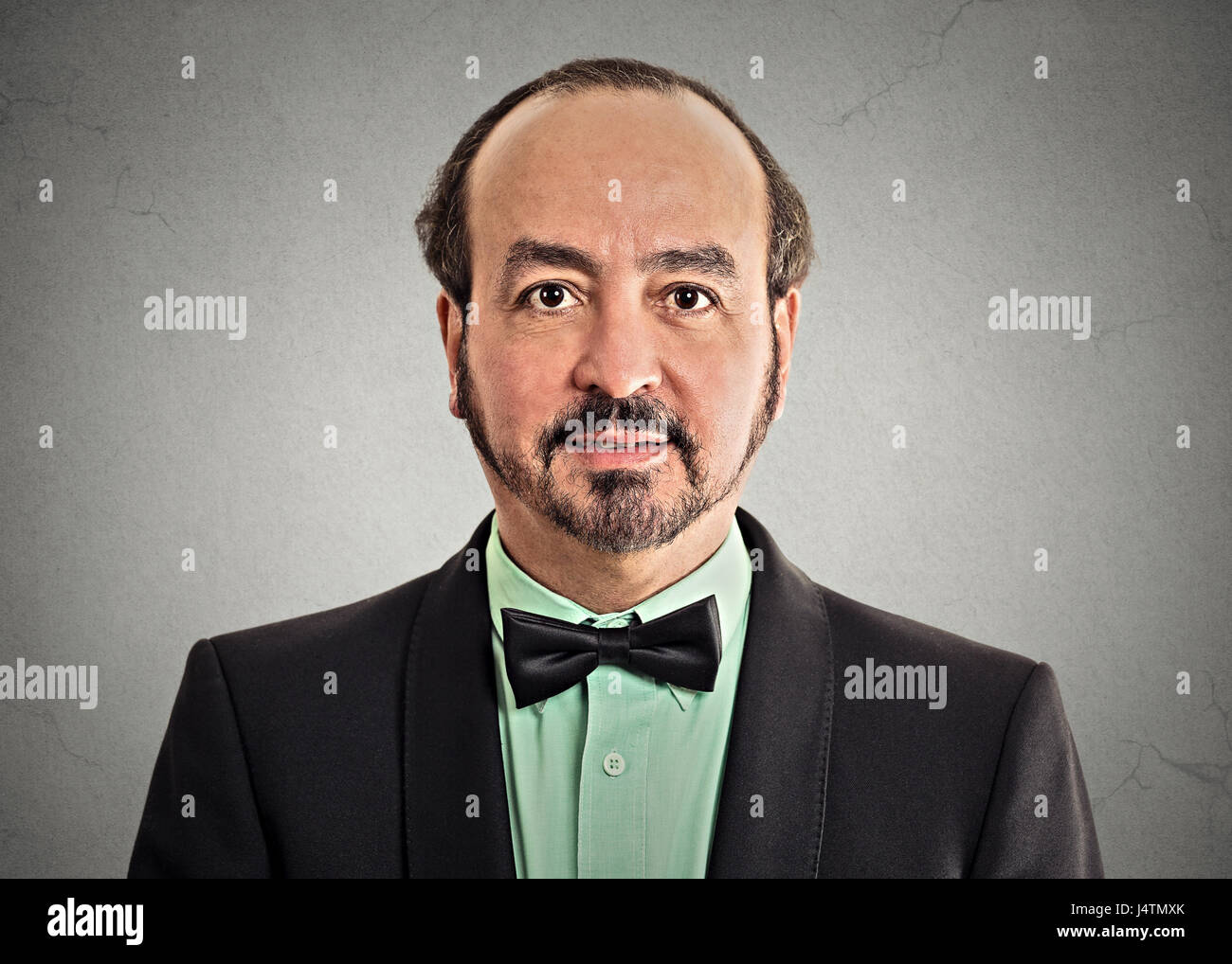 Suit with bow tie hi-res stock photography and images - Alamy