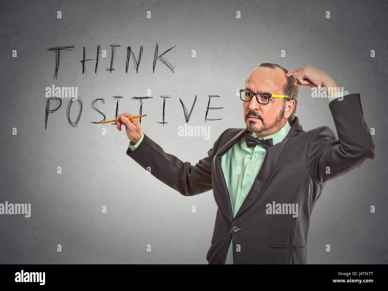 think positive thoughtful middle age businessman scratching head ...