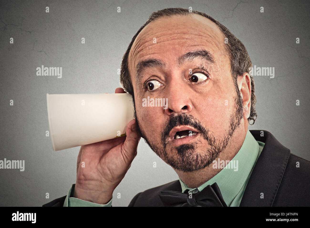 curious businessman listening to conversation. Face expression ...