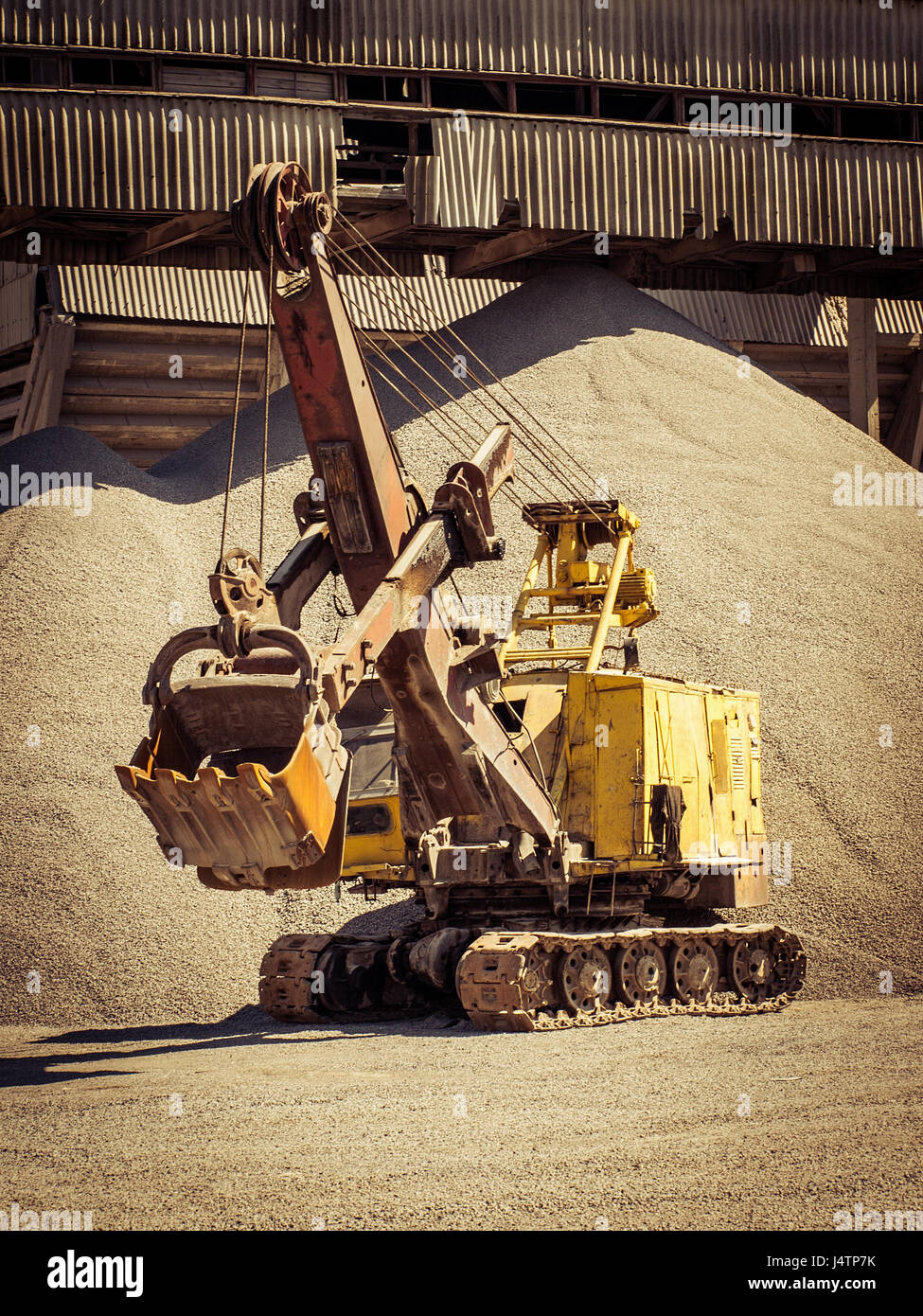 Old excavator on the stone quarry production site Stock Photo - Alamy