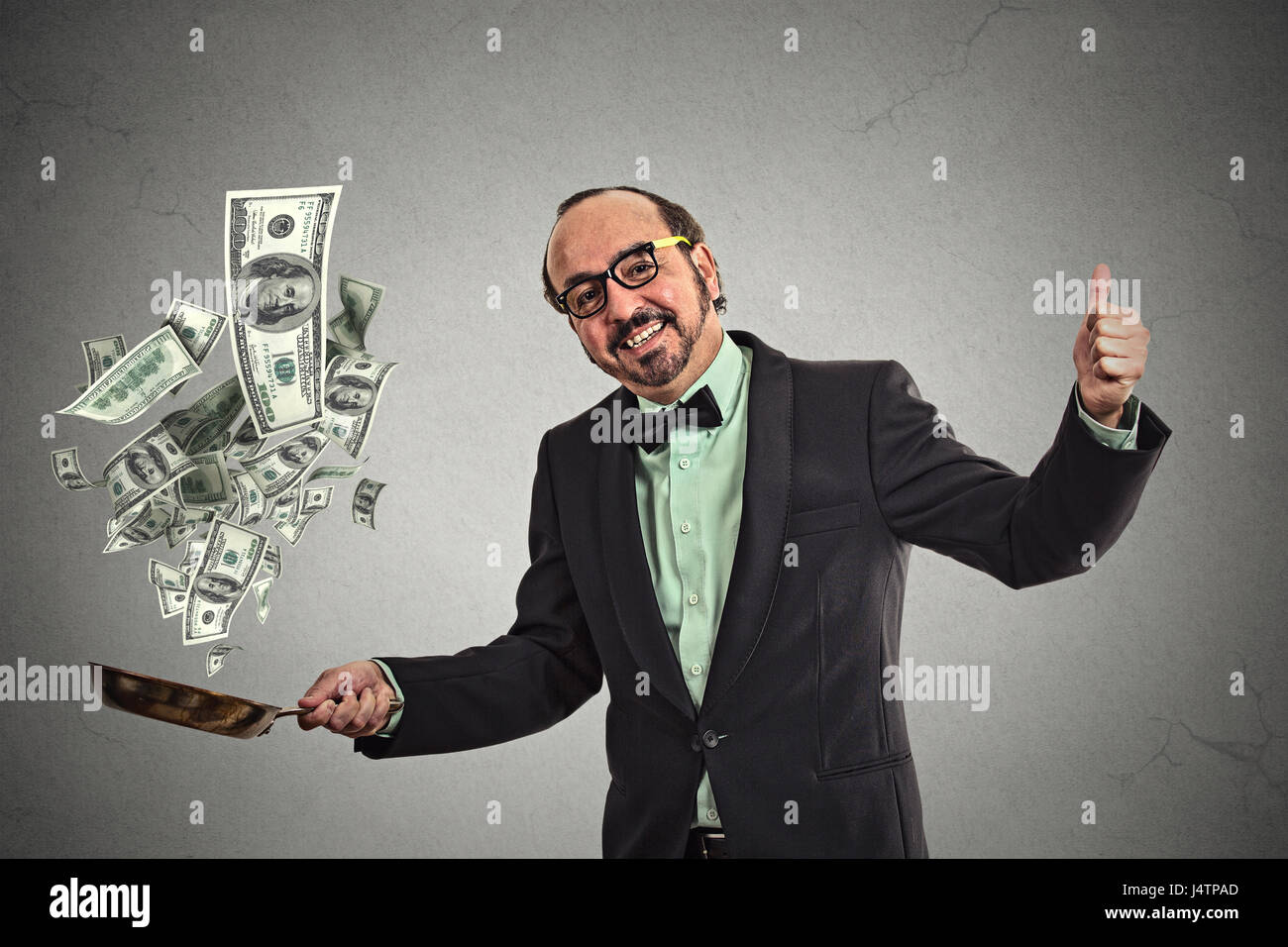 Middle age businessman juggling money dollar bills banknotes isolated ...