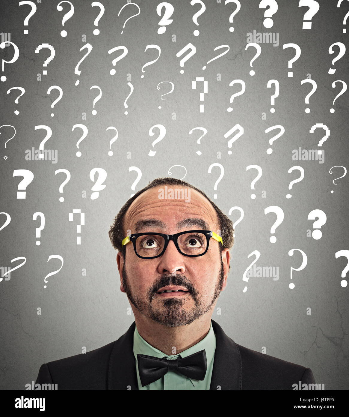 Headshot middle aged man with puzzled face expression and question ...