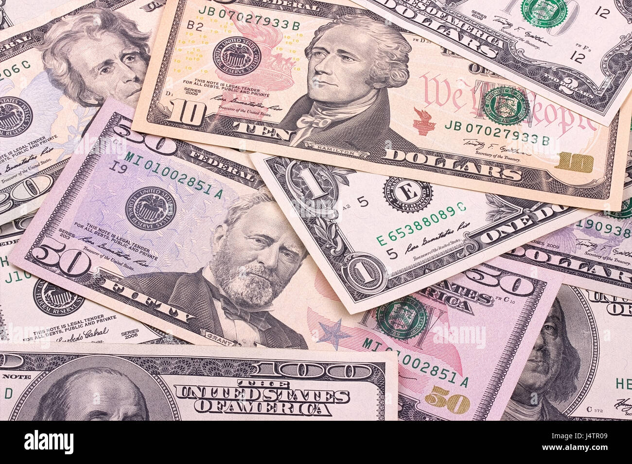Abstract dollar bills of different denominations background Stock Photo ...