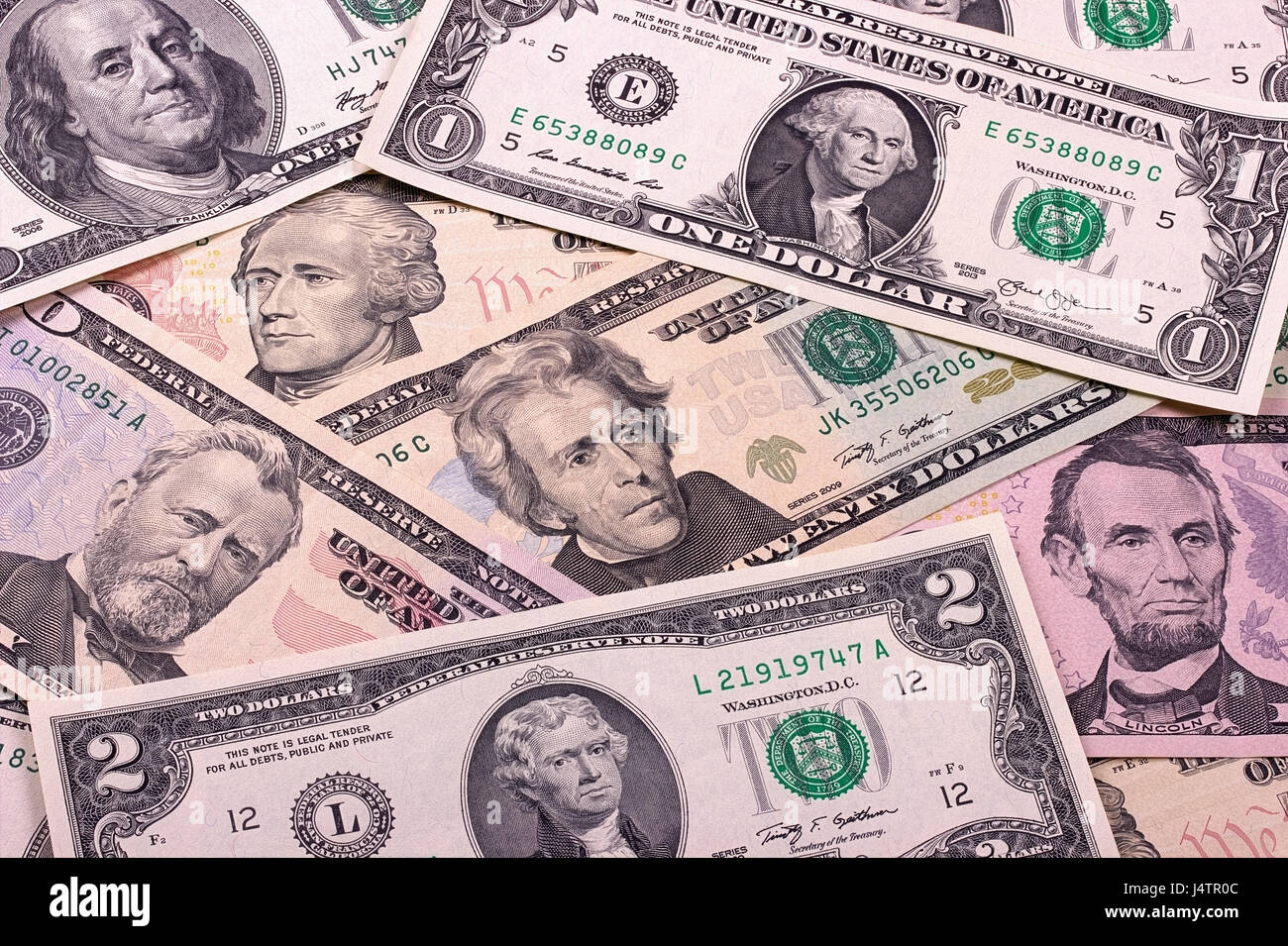 Abstract dollar bills of different denominations background Stock Photo ...