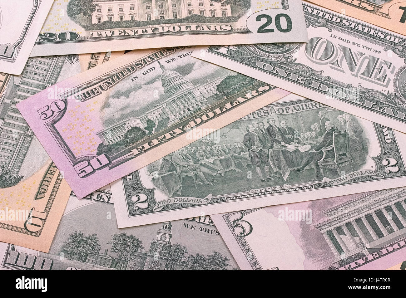 Abstract dollar bills of different denominations background Stock Photo ...