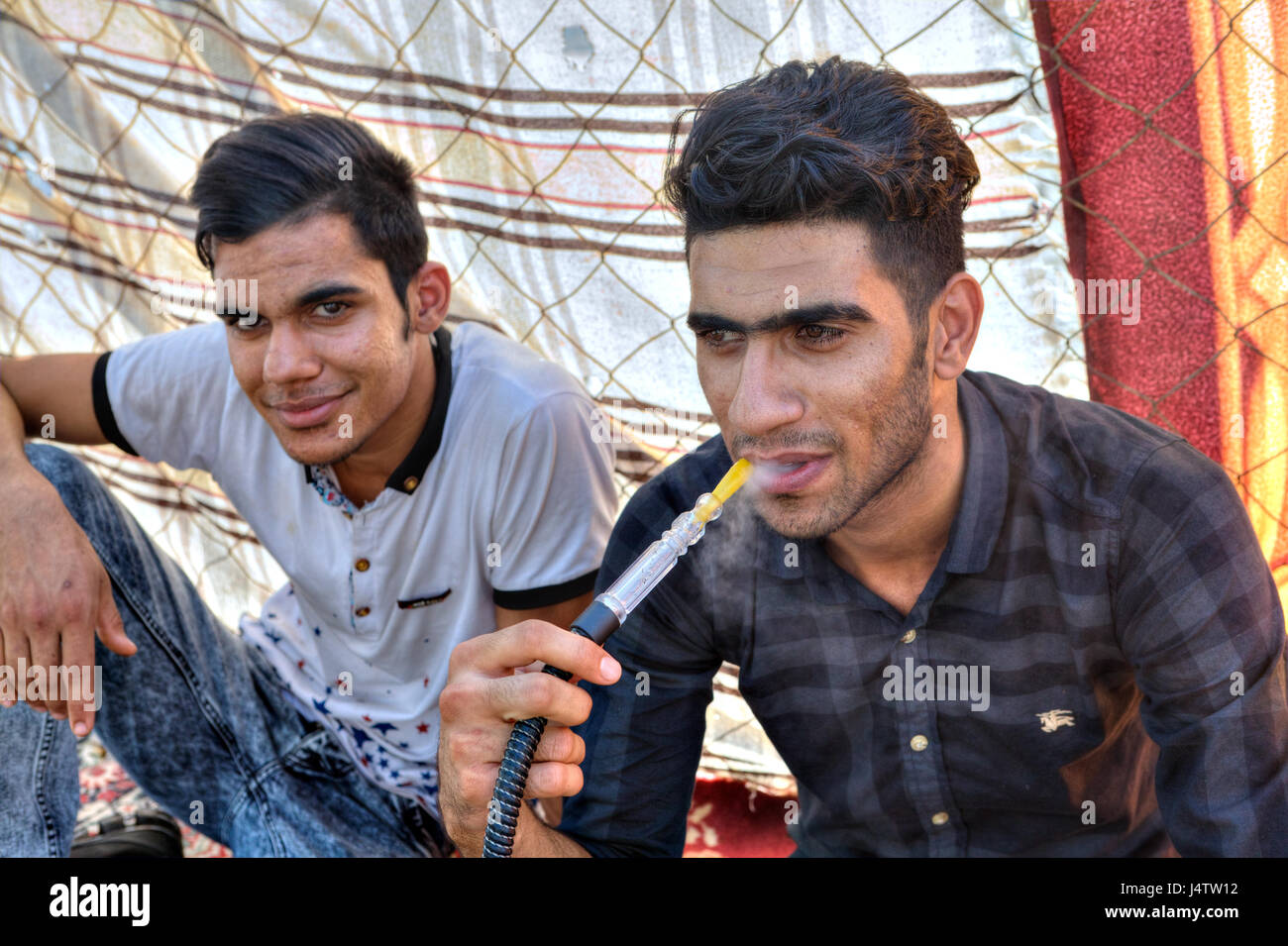 Bandar Abbas, Hormozgan Province, Iran - 16 april, 2017: Two young ...