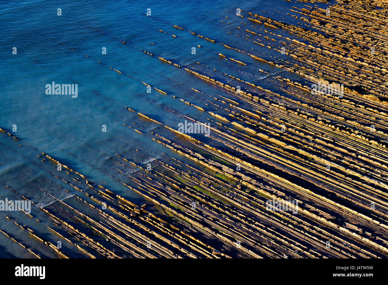 rocky coast in Zumaia with flysches Stock Photo - Alamy