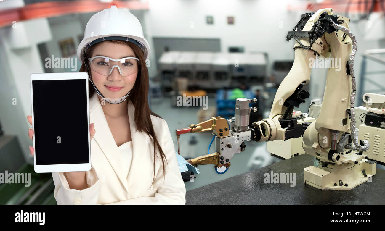 Industry 4th internet of things technology concept. Smile young Asia ...