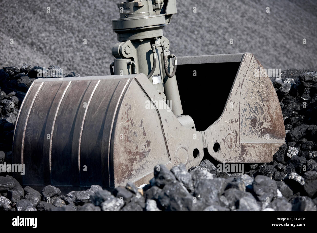 Coal loading excavator, heaps of coal Stock Photo - Alamy