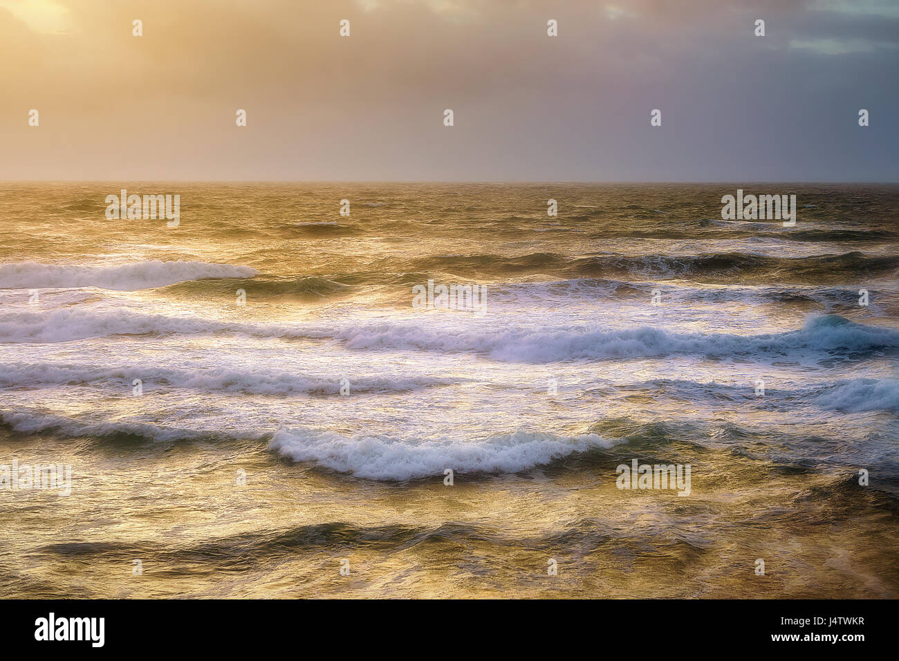 waves in golden sea Stock Photo - Alamy