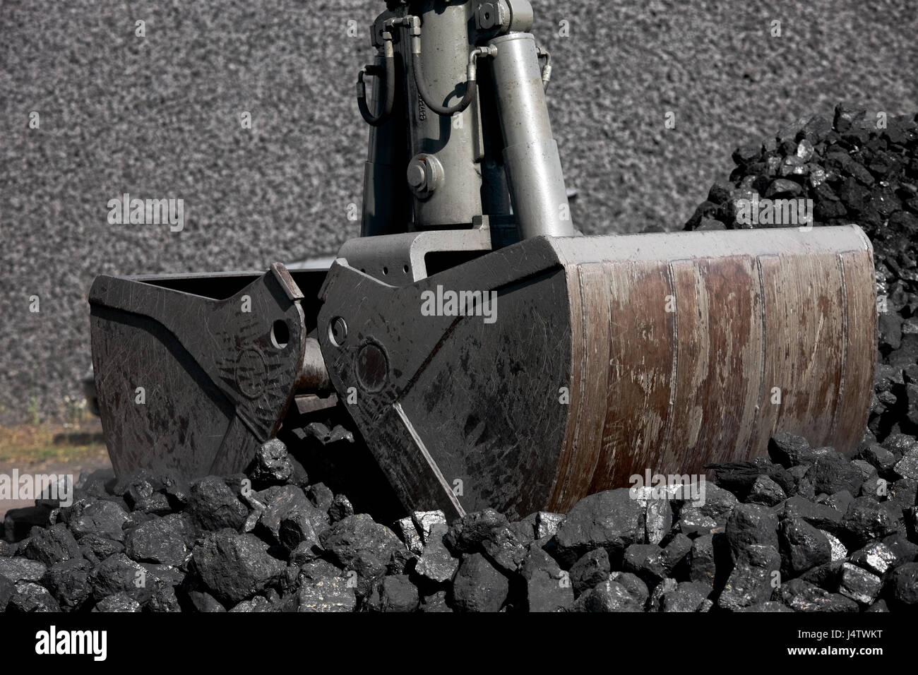 Coal loading excavator, heaps of coal Stock Photo - Alamy