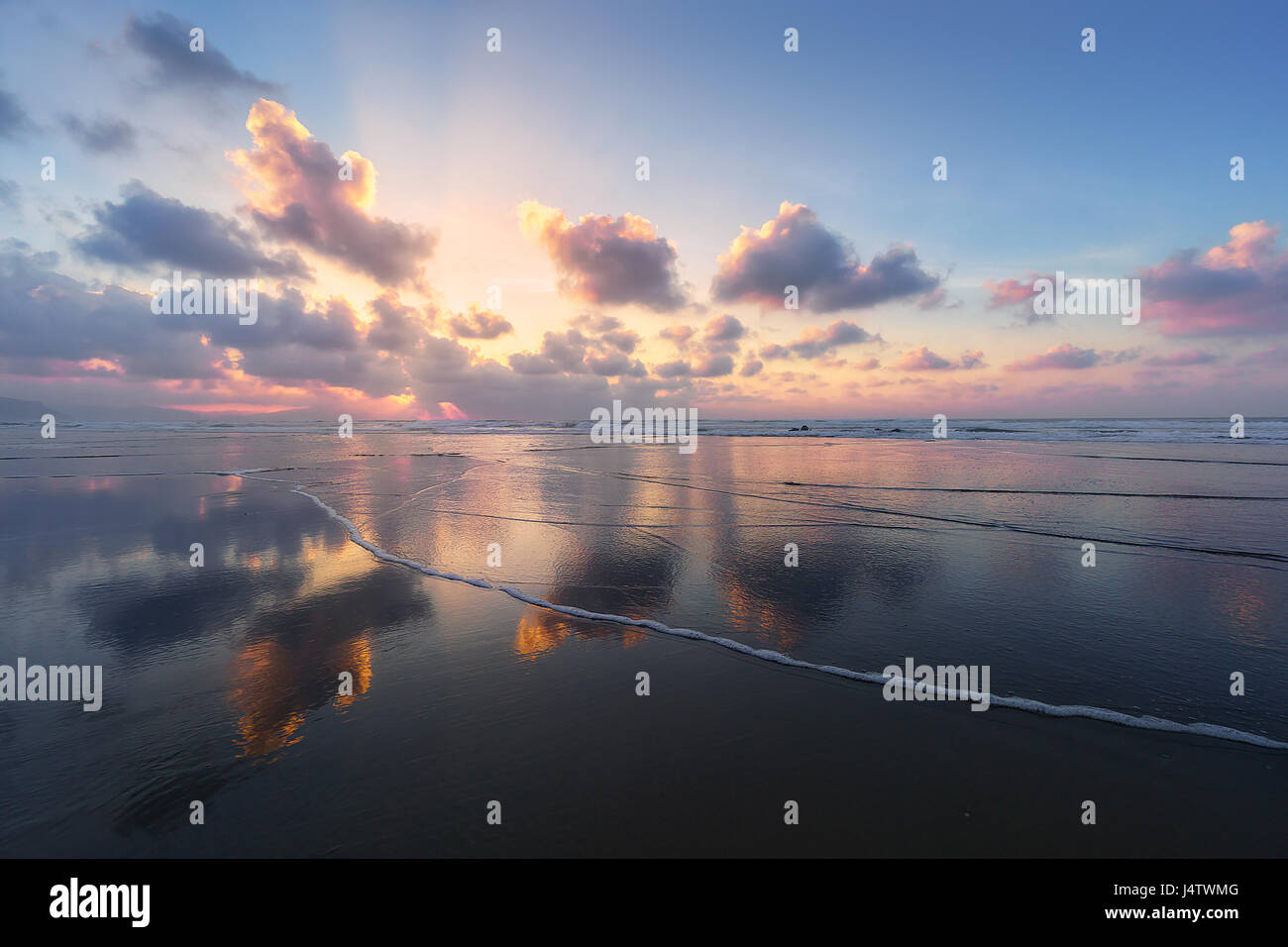 Beautiful sunset clouds reflections on the water hi-res stock ...