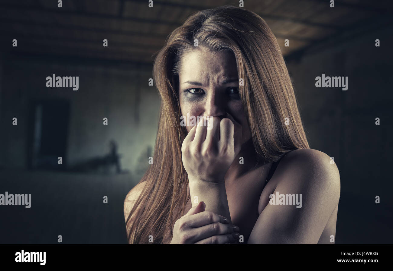 Young crying woman in an abandoned room Stock Photo - Alamy