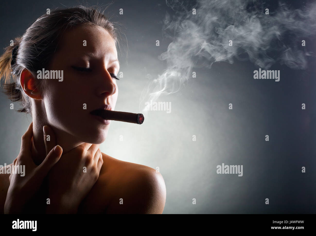 Exhaling Cigar Smoke