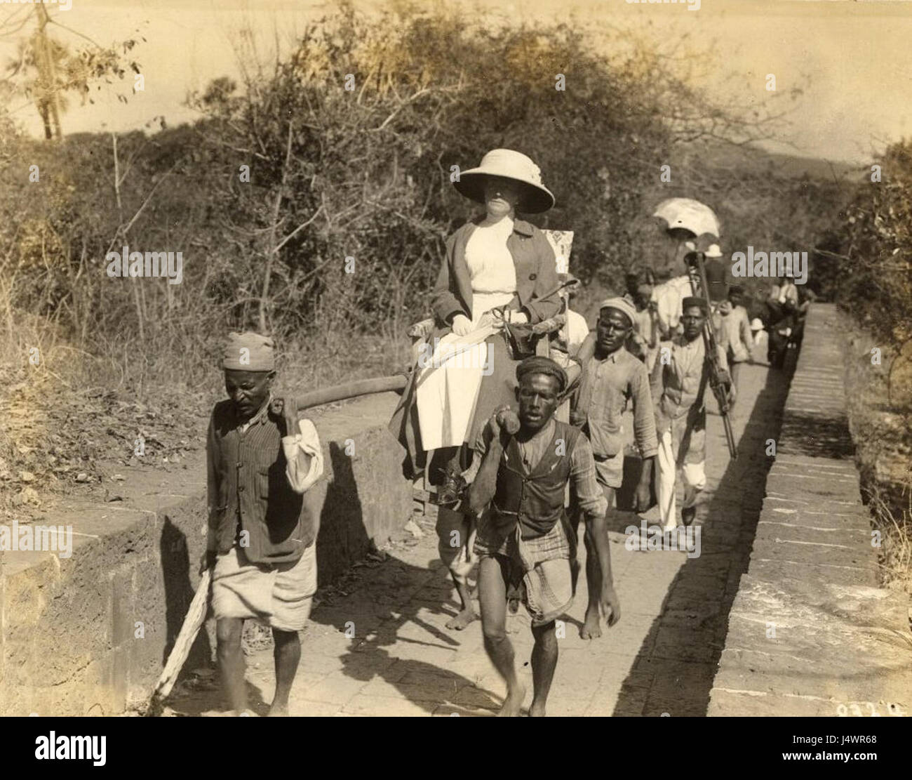 Traveling in a sedan chair Stock Photo - Alamy
