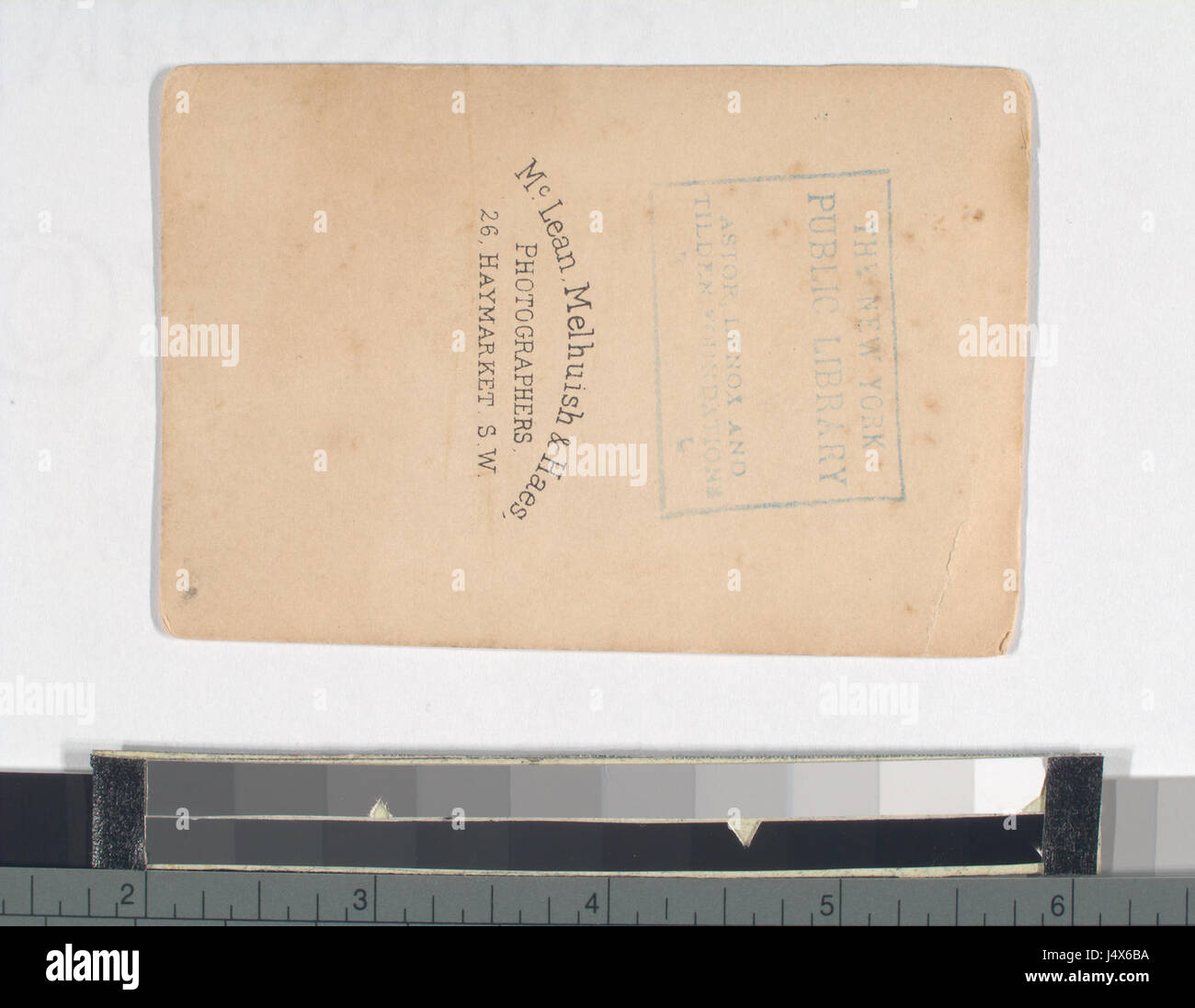 An unknown cricket player, captured in a photograph held by the New ...