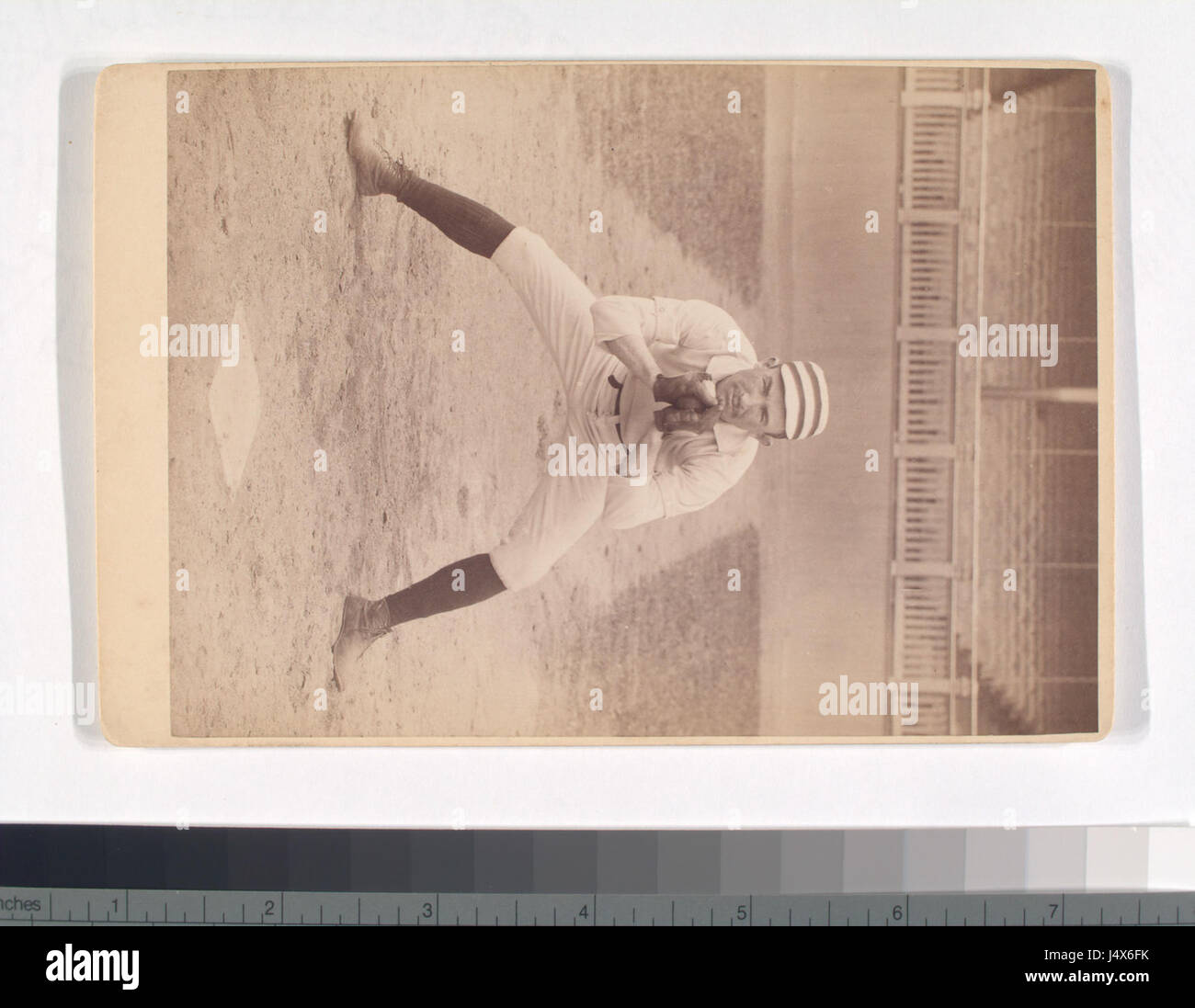 This image features an unidentified baseball player in the catching ...