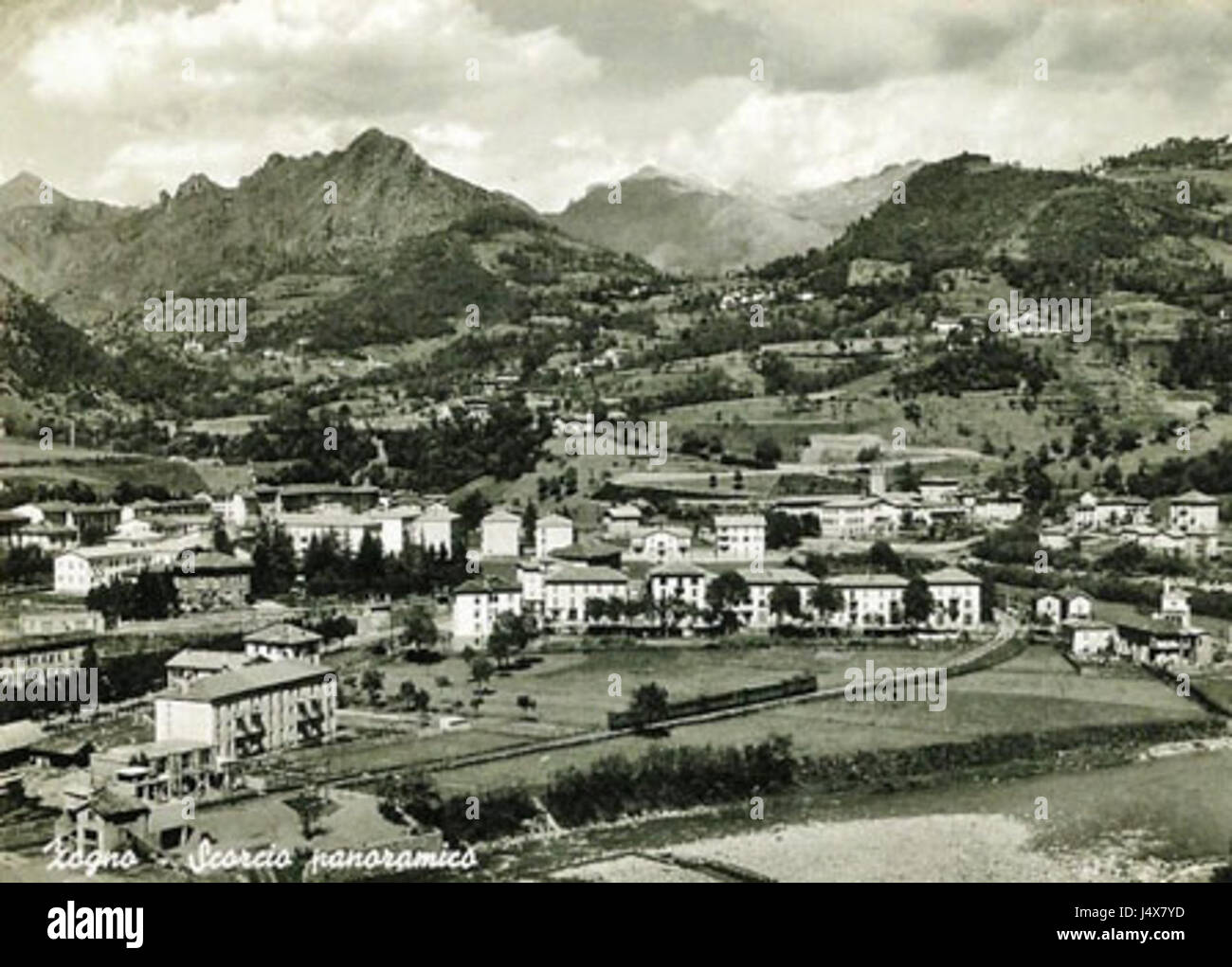 A historical photograph of Zogno, Italy, showing a railway in the ...