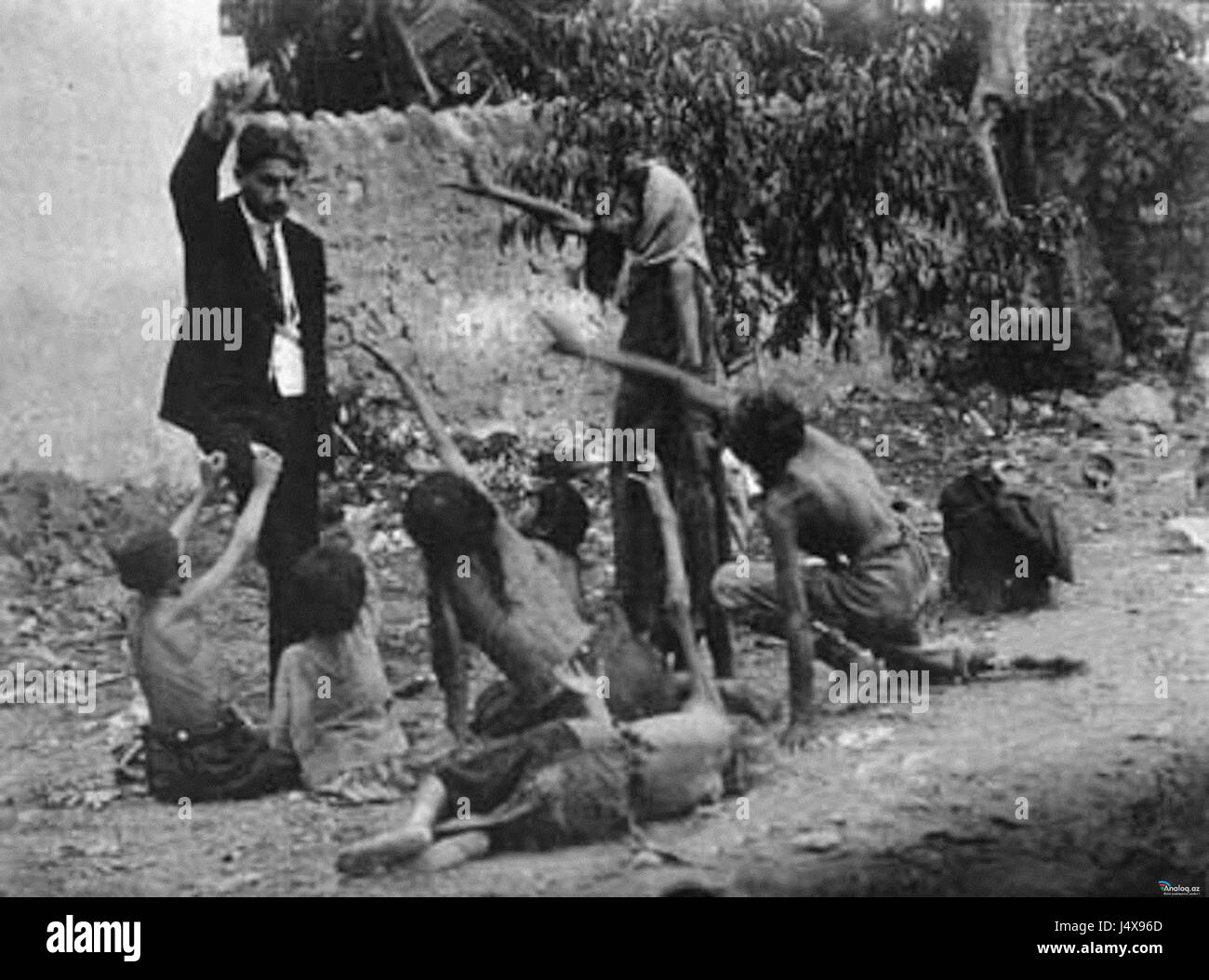 This disturbing image from 1915 shows a Turkish official taunting ...