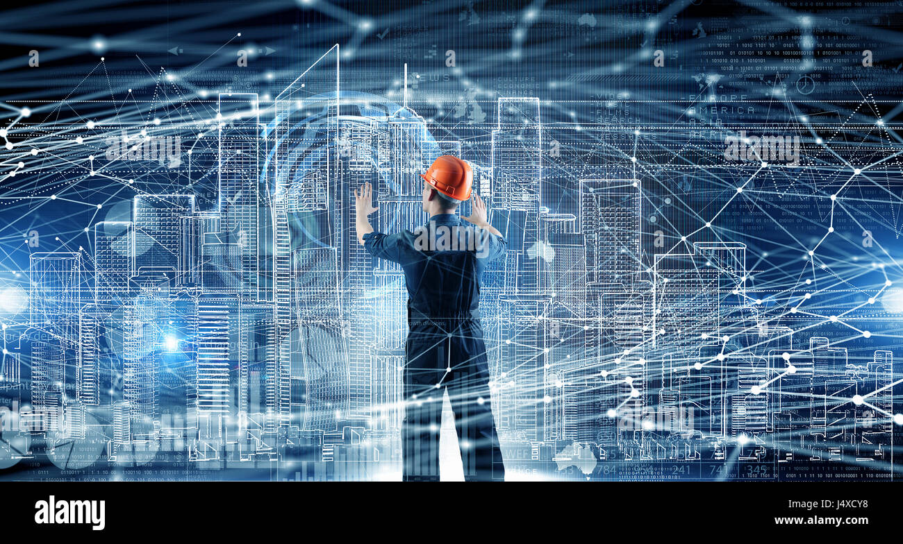 Engineer man standing with back and working with construction ...