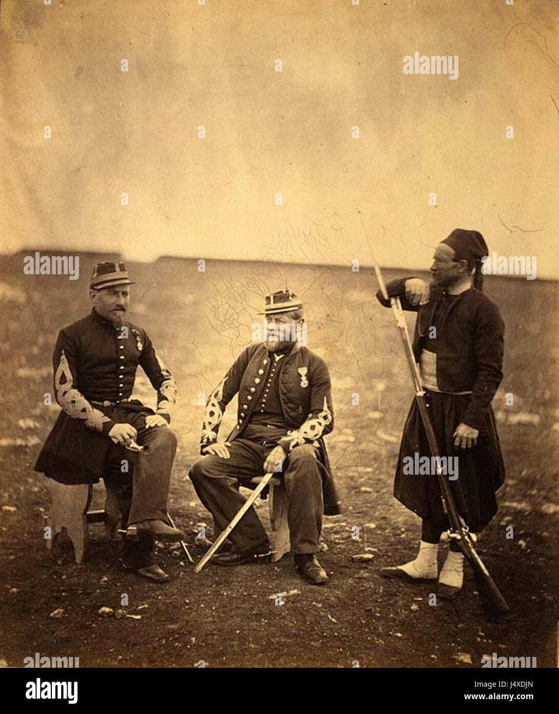 This photograph or artwork depicts two French Zouaves officers and a ...