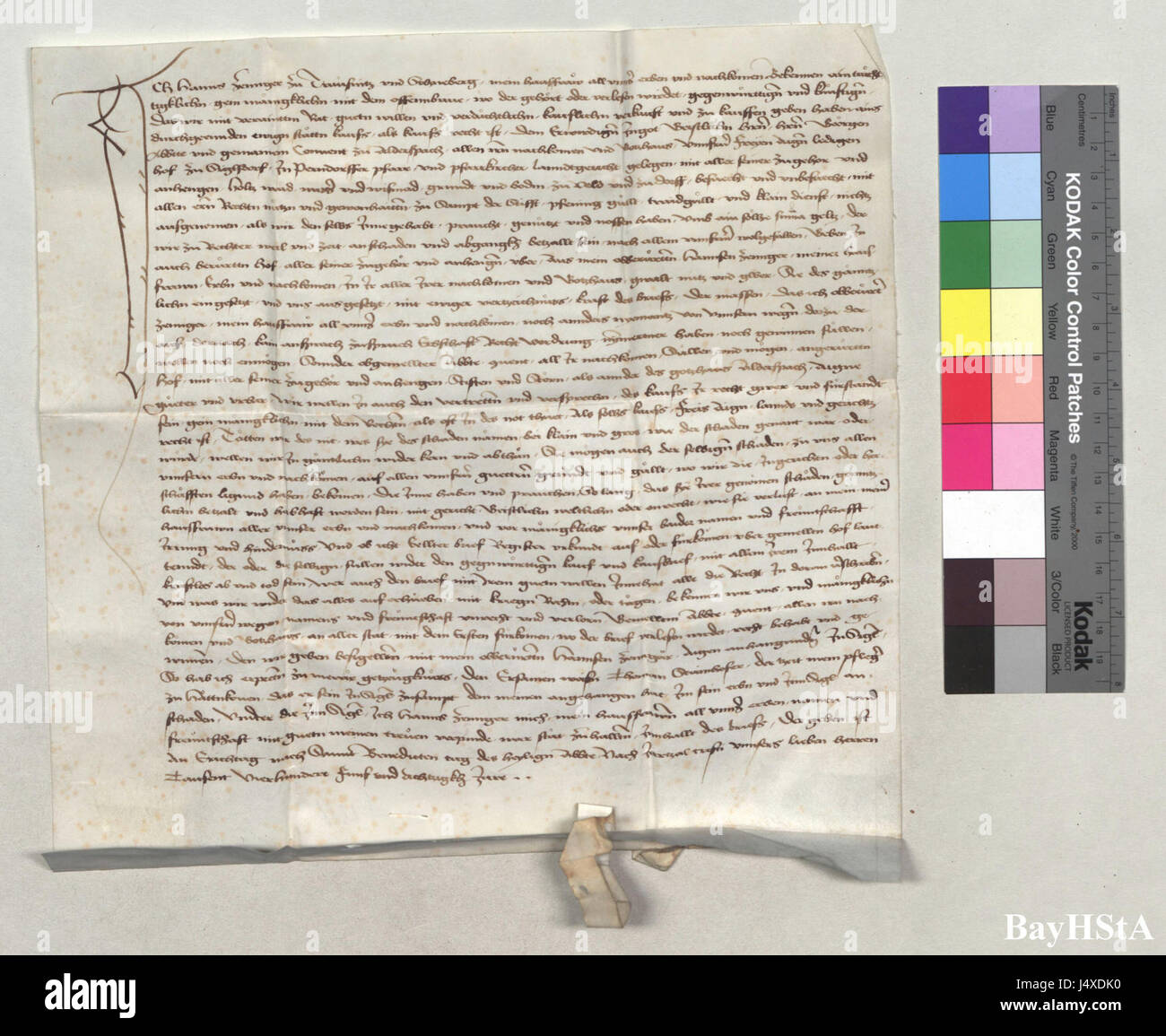 This document, a medieval certificate or deed, involves Hanns Zennger ...