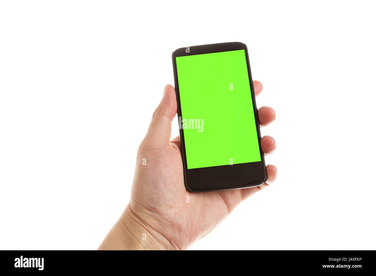 hand holding and showing smartphone with green screen. Isolated on ...
