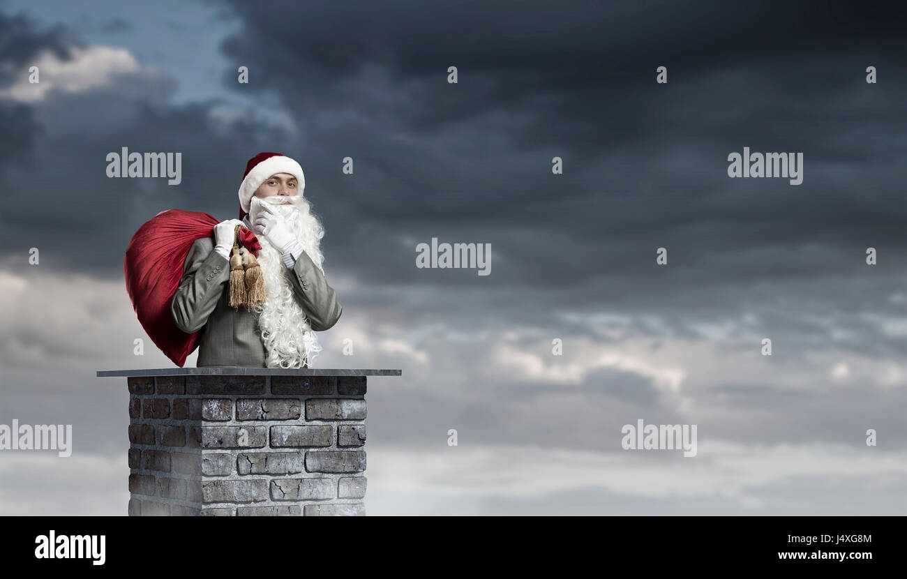 Santa claus stuck in chimney hi-res stock photography and images - Alamy