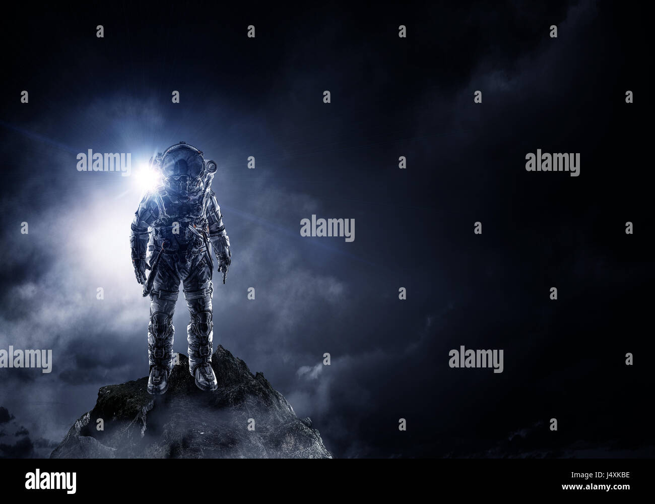 Astronaut explorer against dark night sky background. Mixed media Stock ...