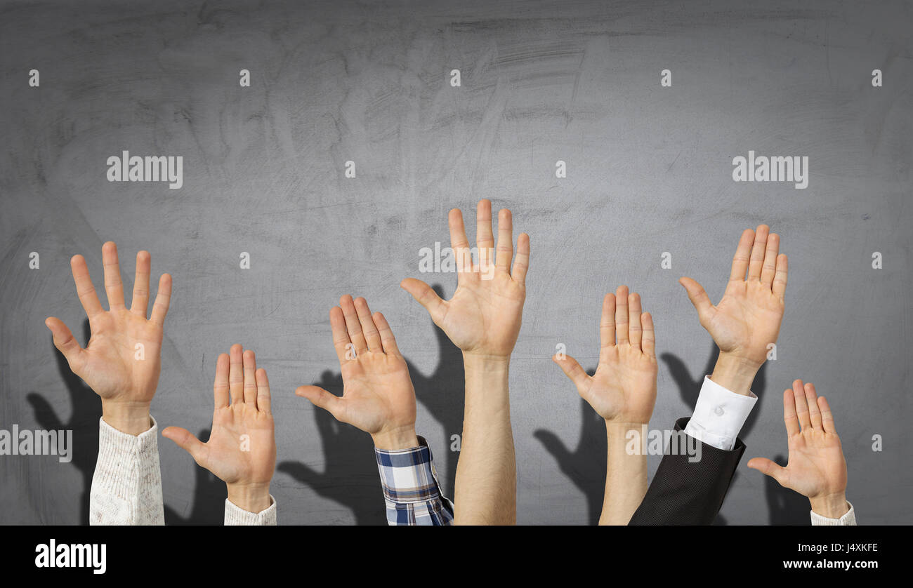 Many people in row raising upward hands showing participation Stock ...