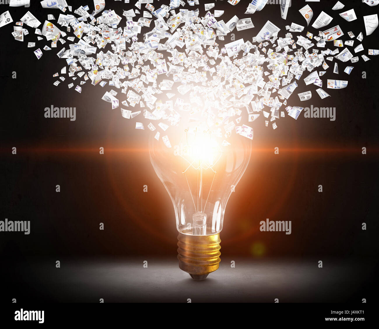Glowing bright light bulb on dark background Stock Photo - Alamy