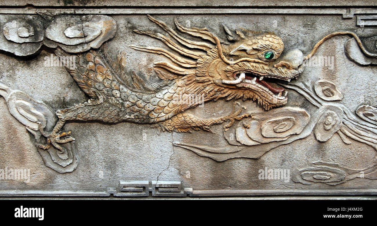 Dragon relief on the outer wall of Quan Thanh Temple, Hanoi, Vietnam ...