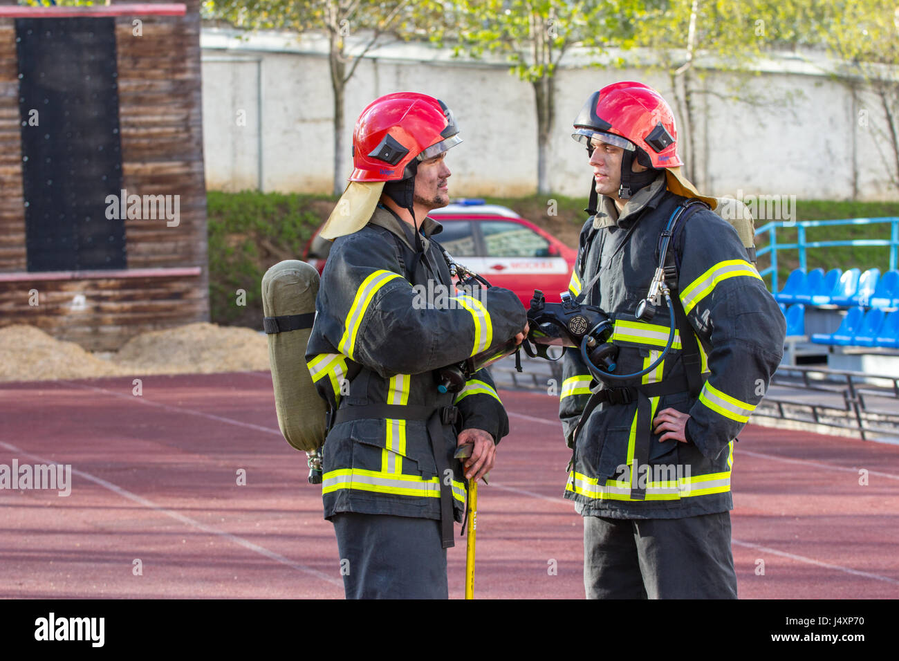 Portrait of two heroic fireman Stock Photo - Alamy