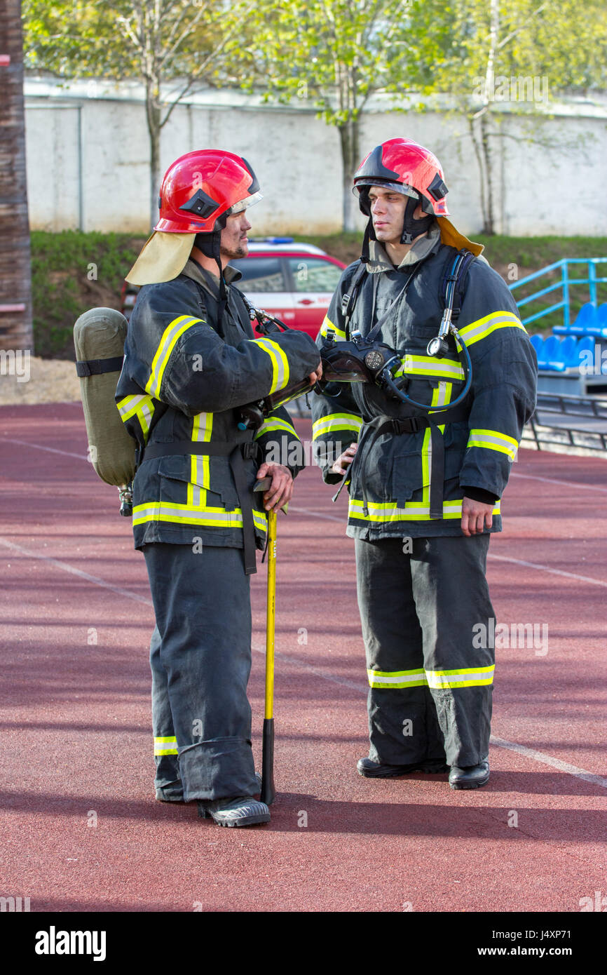 Portrait of two heroic fireman Stock Photo - Alamy