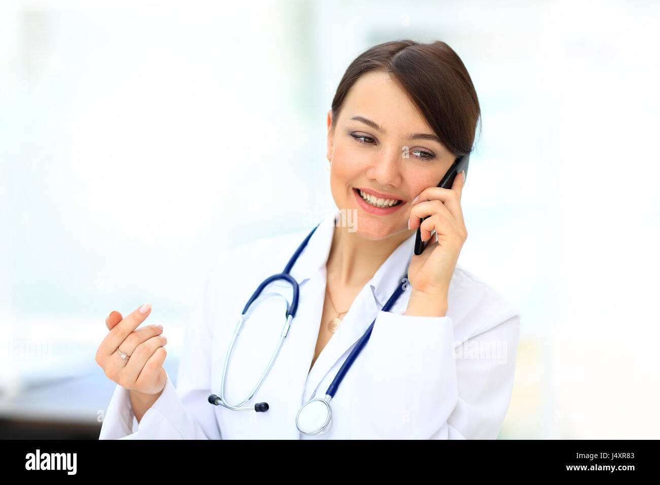 Doctor talking good news Stock Photo - Alamy