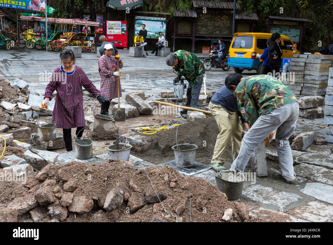 Zhenyuan, Guizhou, China. Women Working as Part of a Street-repair Crew ...