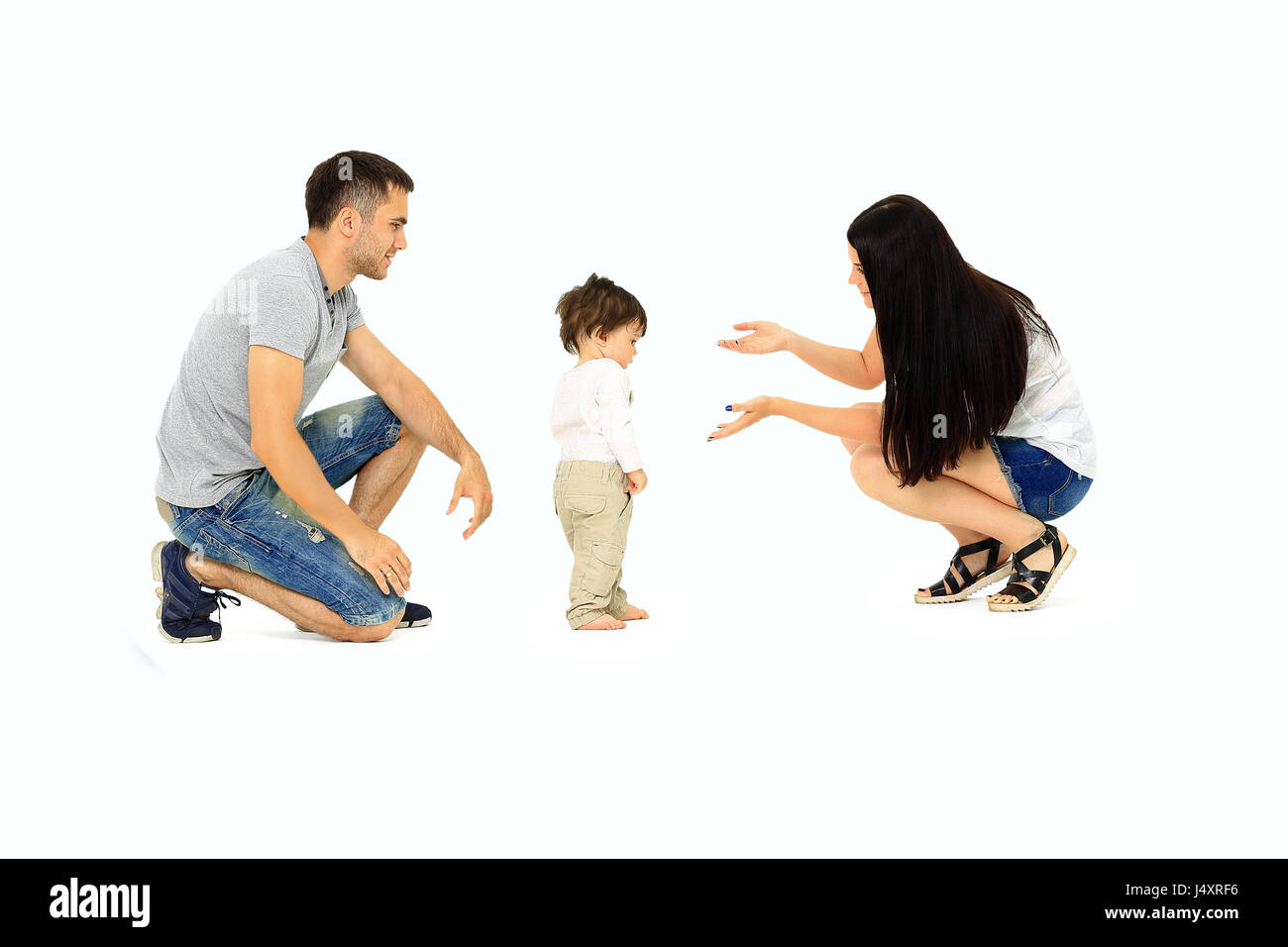 Cute smiling baby girl learning to walk Stock Photo - Alamy