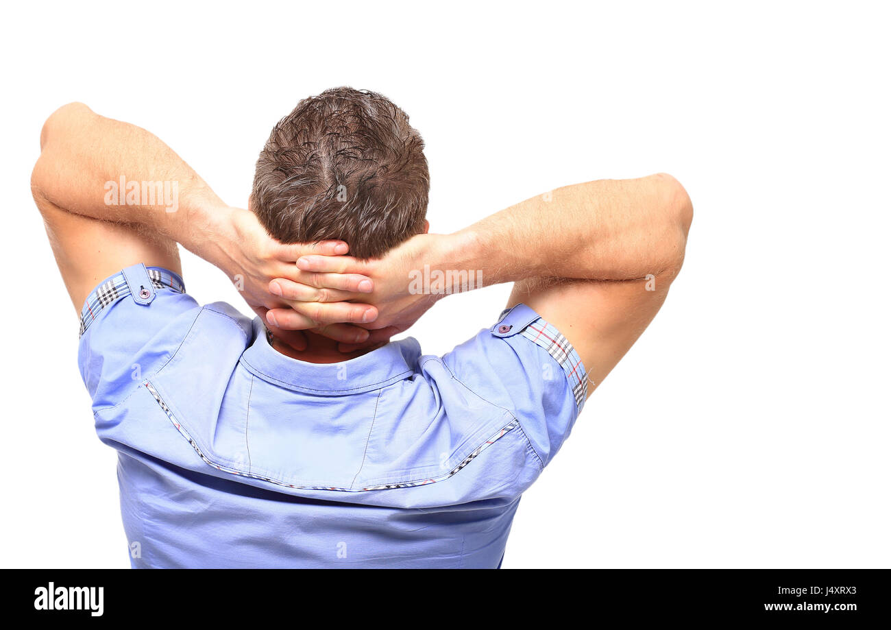Man with hands behind head Stock Photo - Alamy