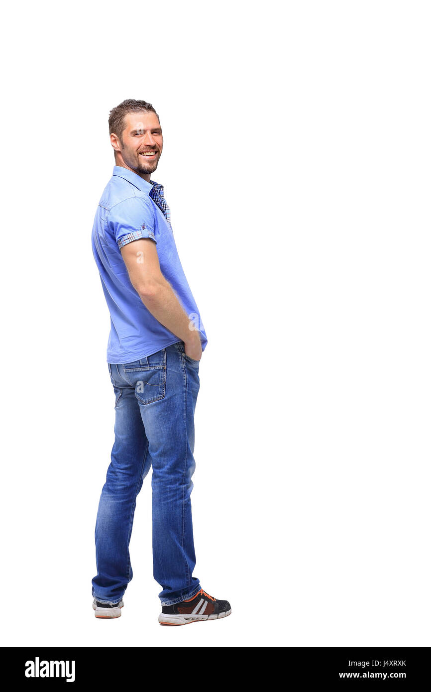 Portrait of the young smiling turned man isolated on a white ba Stock ...